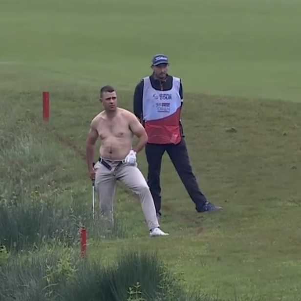 DP World Tour pro takes off shirt and unbuckles belt(?) to play muddy ...